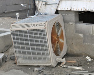 Photograph of a damaged air conditioning unit