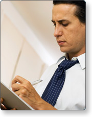 Incident Commander writing on pad of paper