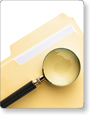 A magnifying glass and a file folder.