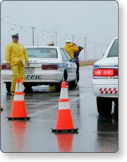 Police restricting access to an incident scene